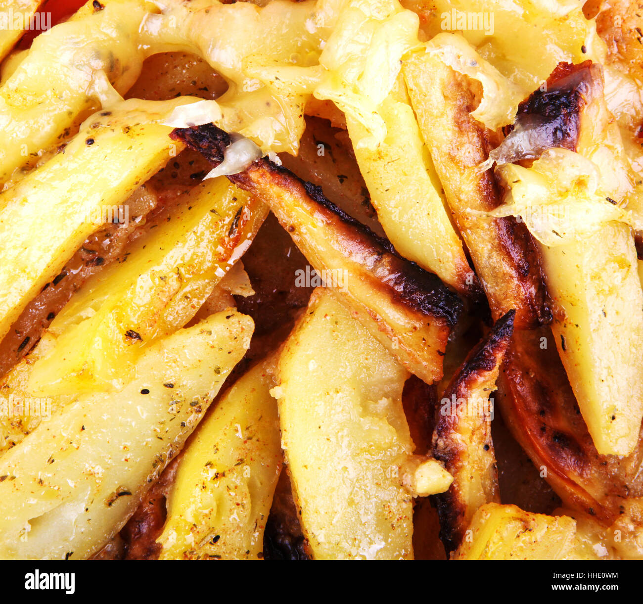 Roasted potatoes background Stock Photo - Alamy