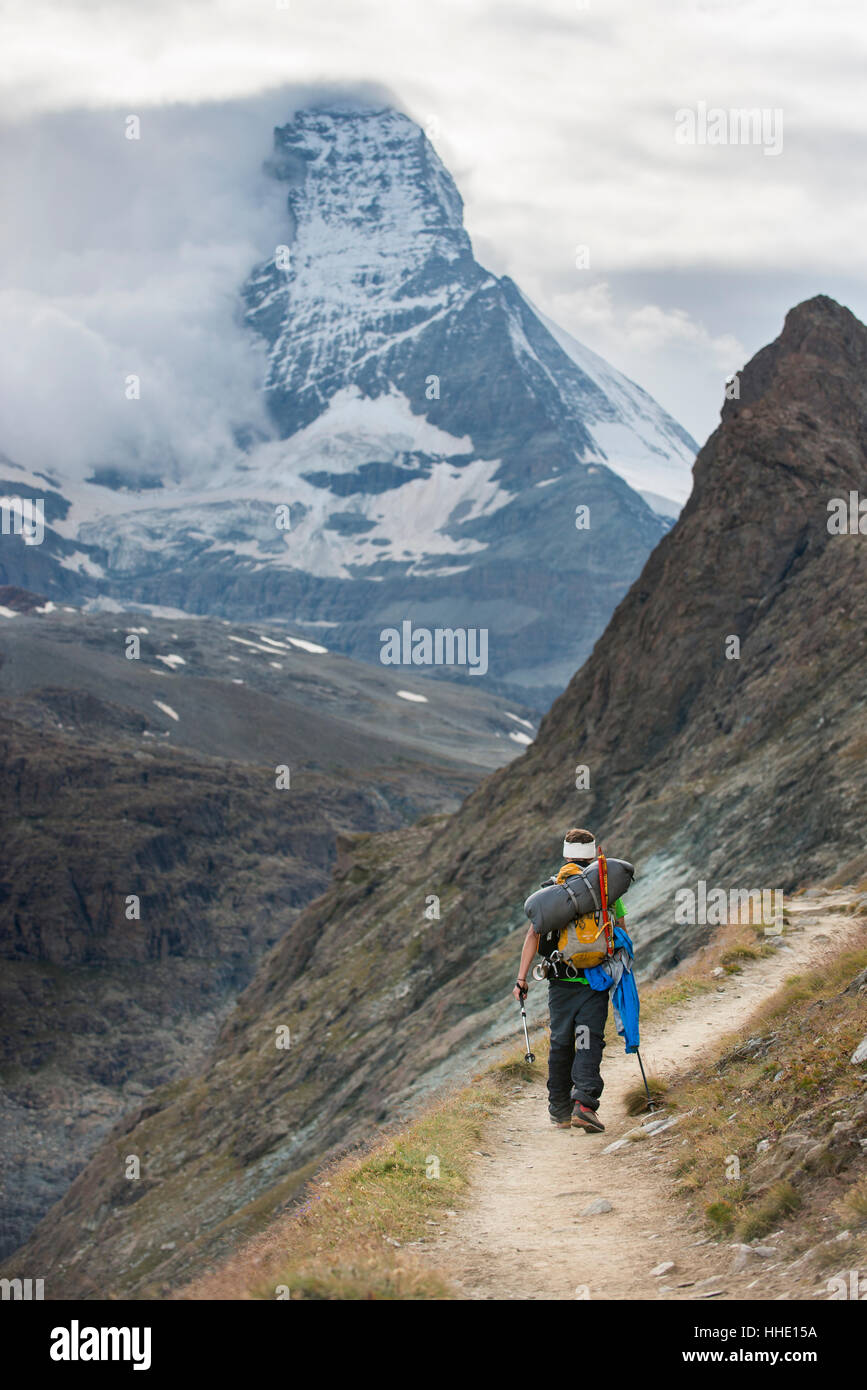 Hiking a trail in the Swiss Alps near Zermatt with a view of The ...