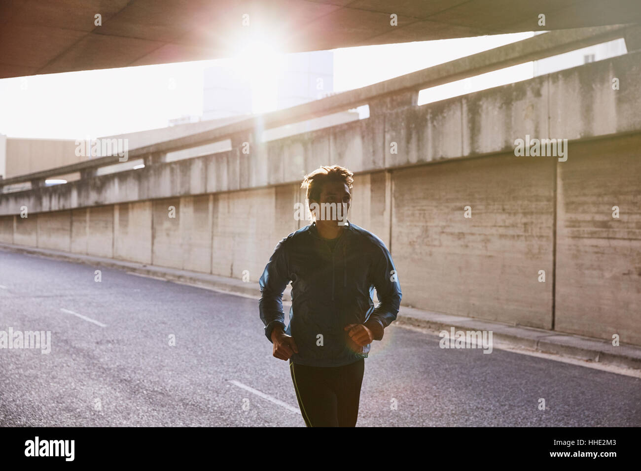 Running man front runner hi-res stock photography and images - Alamy