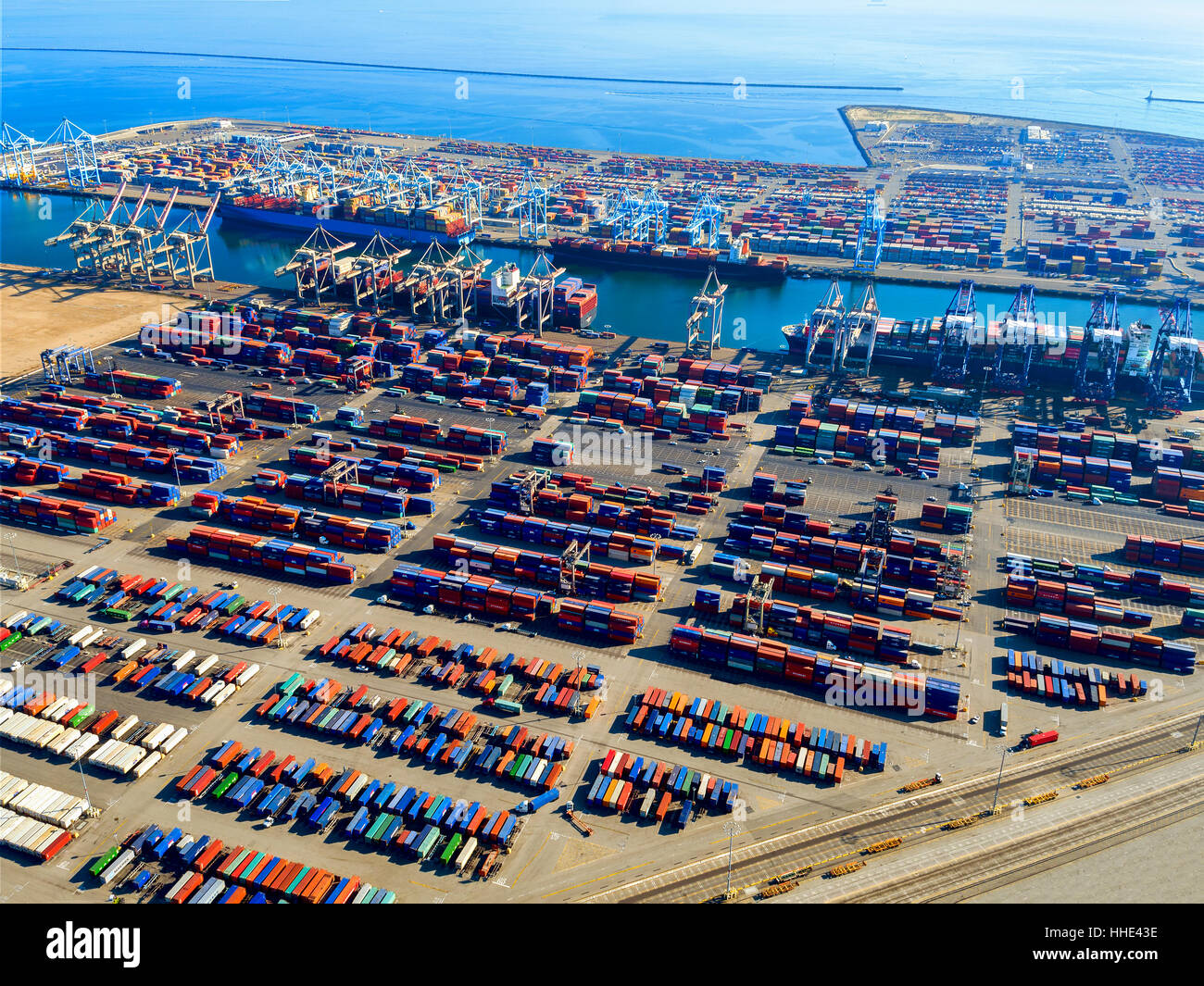 Aerial view of the container port at San Pedro in Los Angeles, with ships docked and containers ...