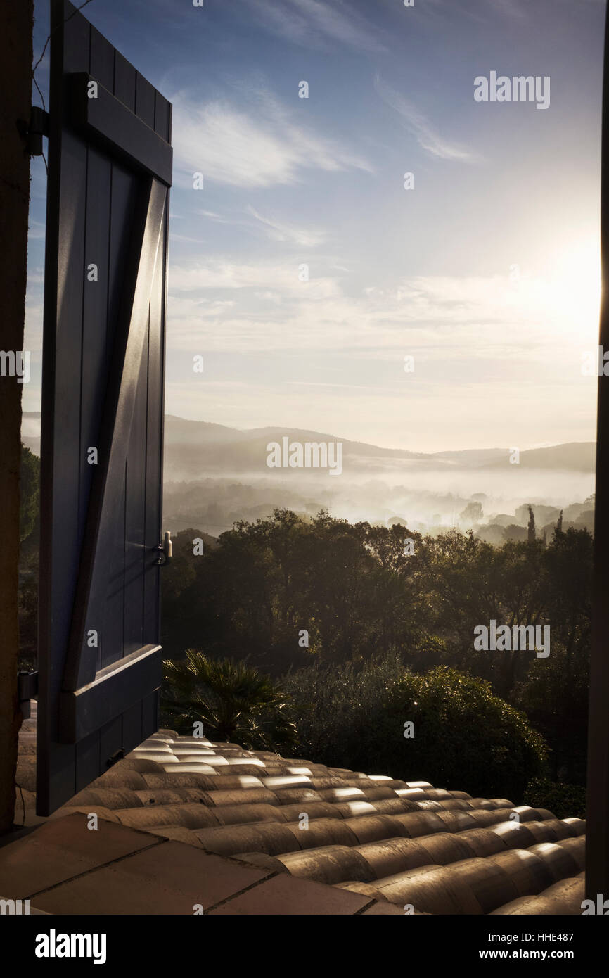 View through an open window, over a lake and mountain landscape Stock ...