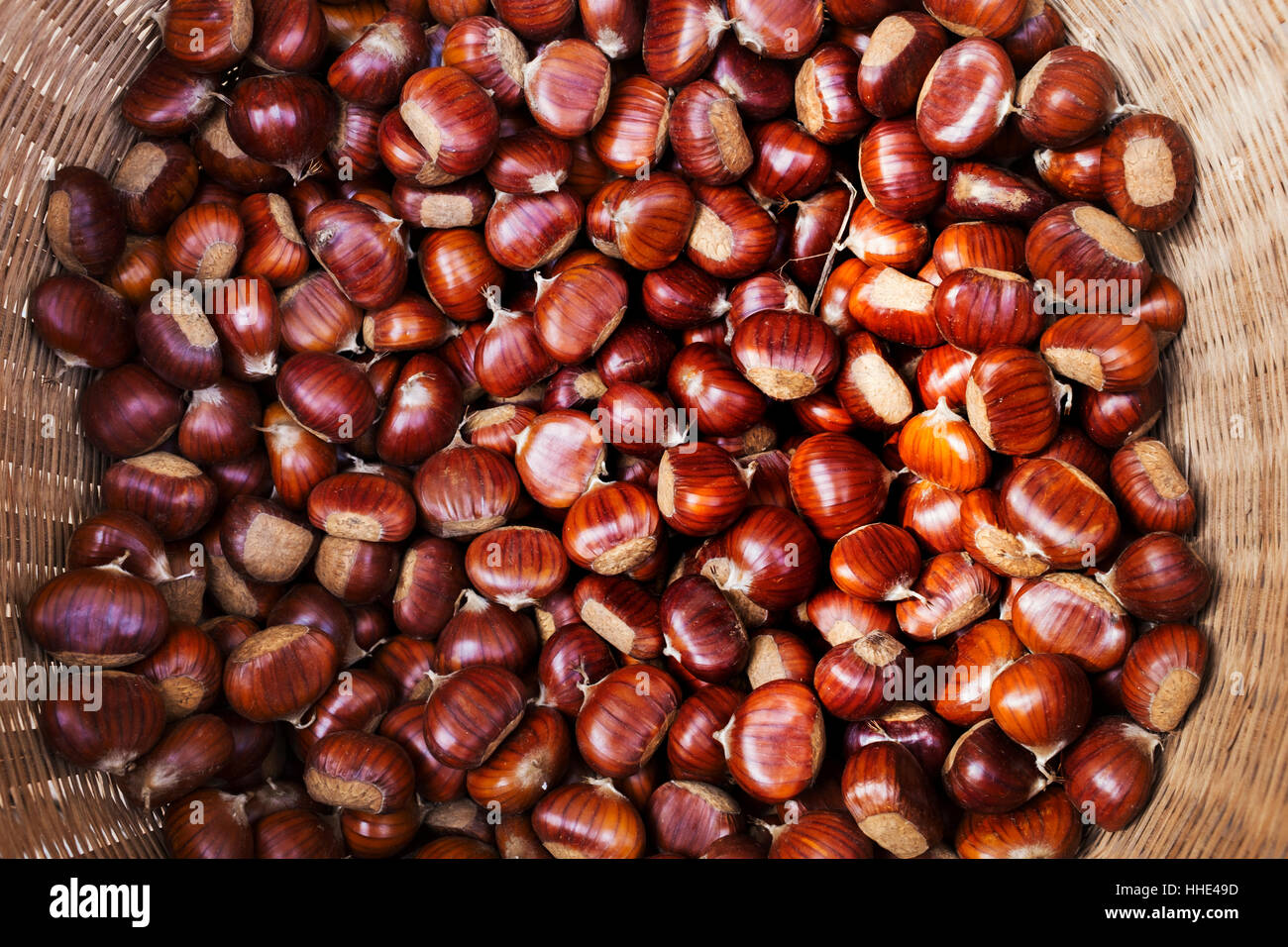 A basket of roasted sweet edible chestnuts Stock Photo - Alamy