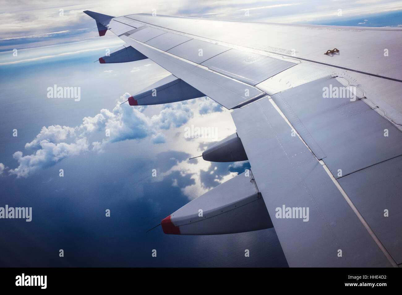 View from an aircraft window of an aeroplane wing, in flight Stock ...