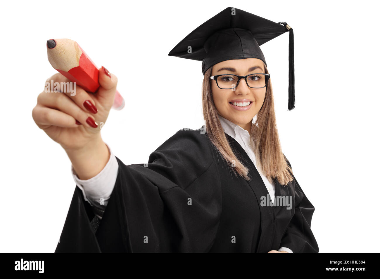 Cheerful female graduate student writing with a large pencil isolated ...