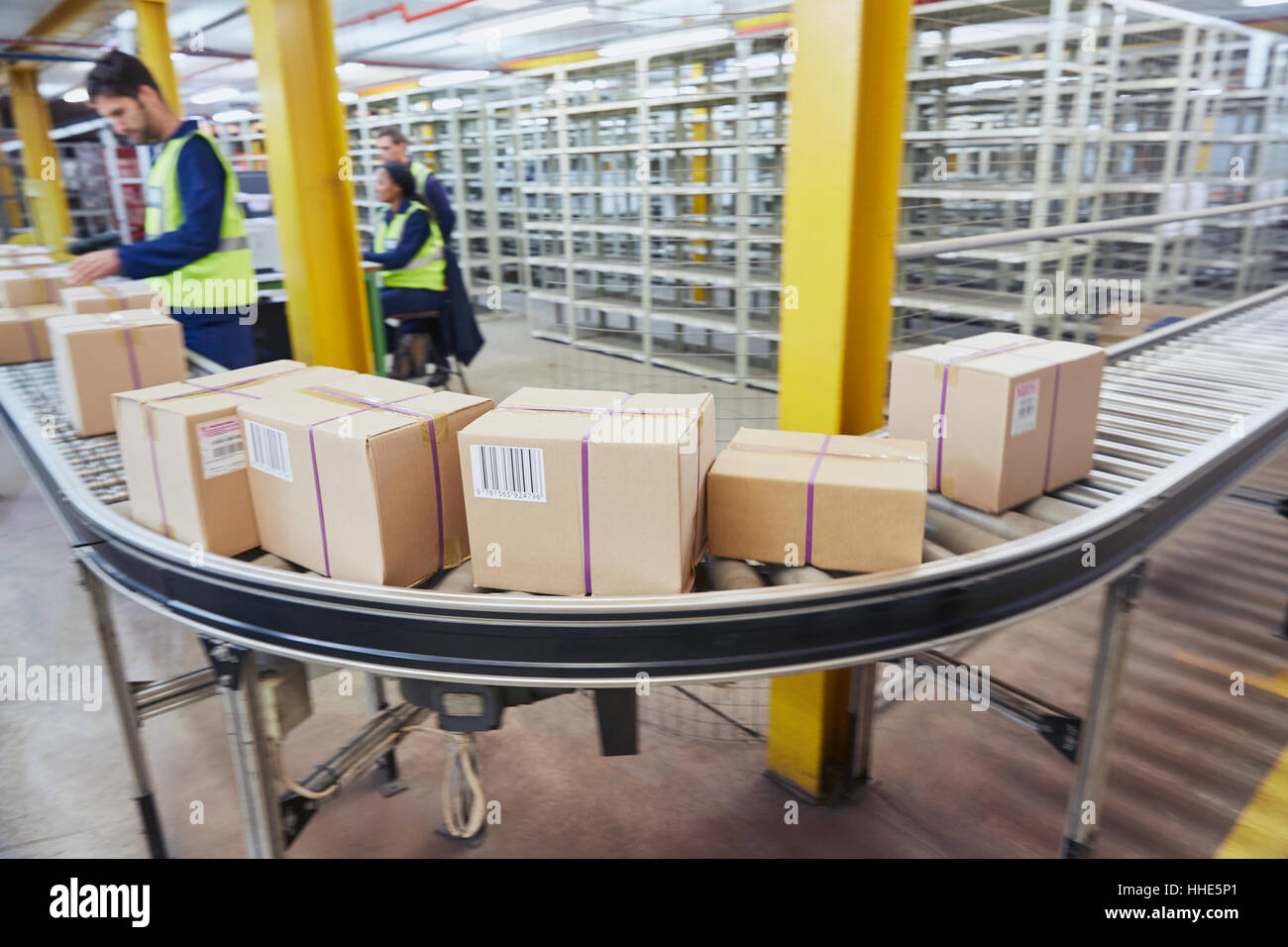 Conveyor belt boxes hi-res stock photography and images - Alamy