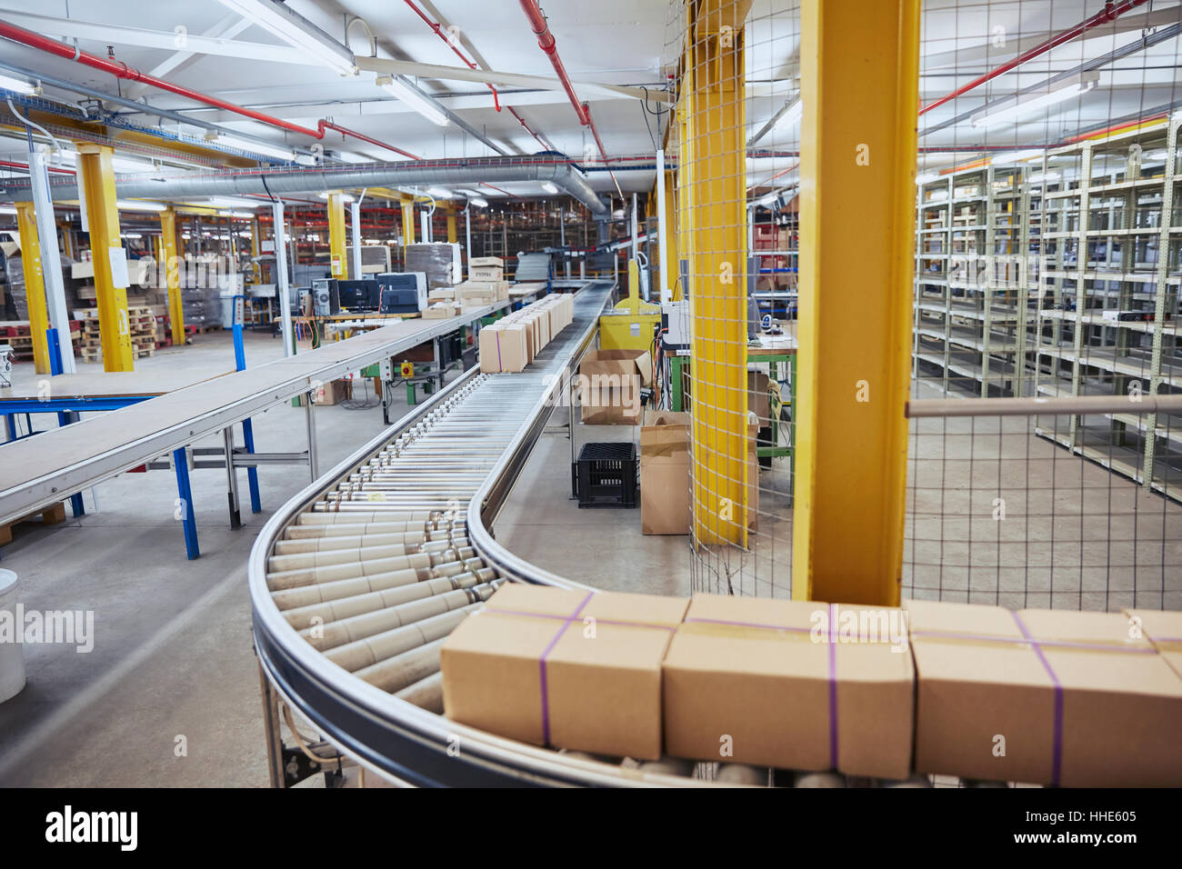 Conveyor belt boxes hi-res stock photography and images - Alamy