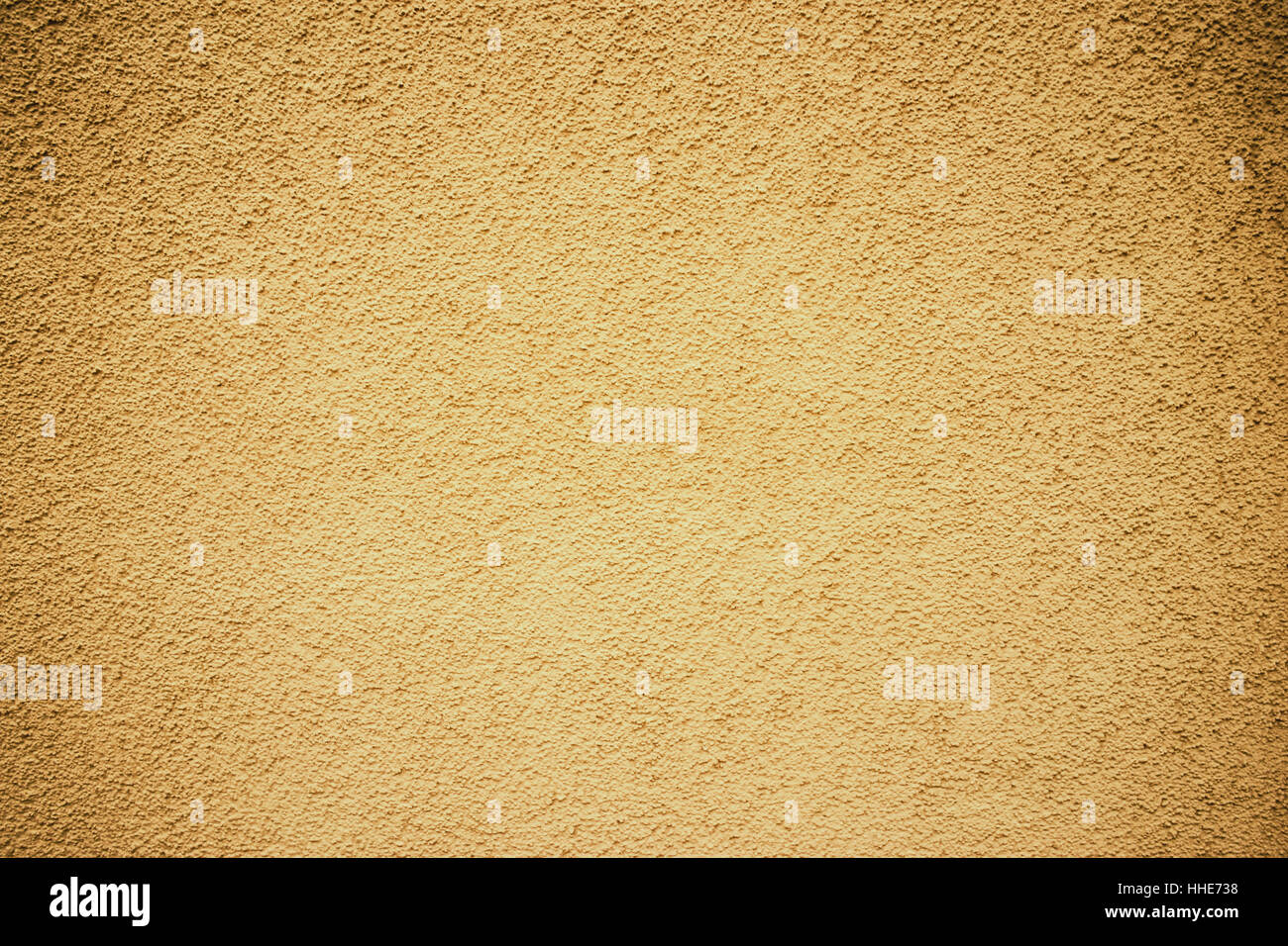 Golden background texture with natural grain Stock Photo - Alamy