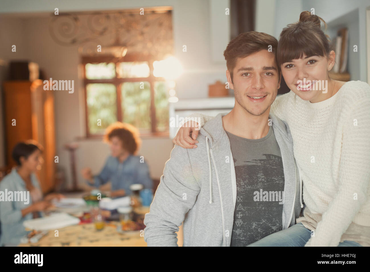 Young couple hugging front hi-res stock photography and images - Alamy