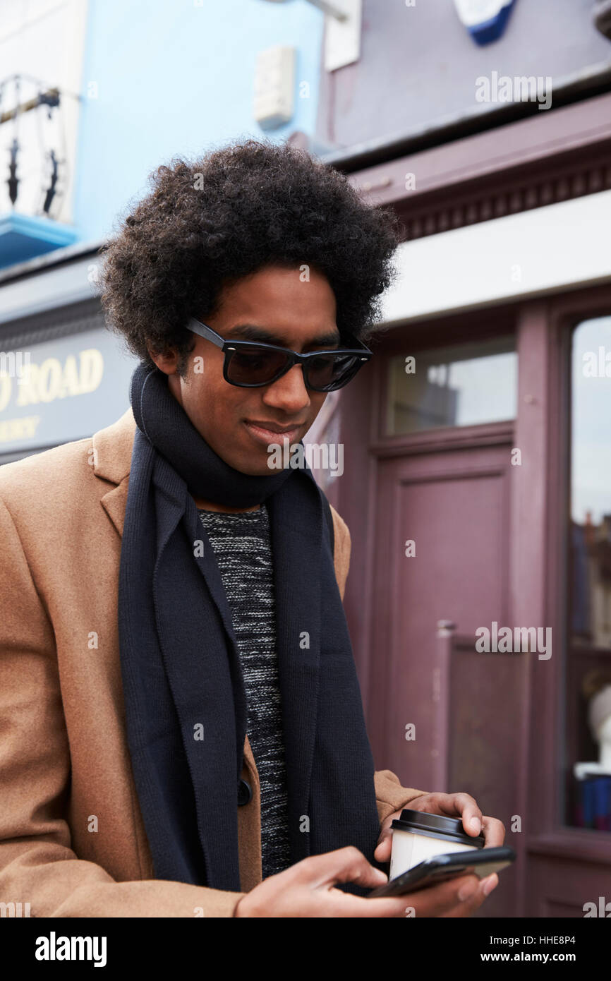 Person on busy street hi-res stock photography and images - Alamy