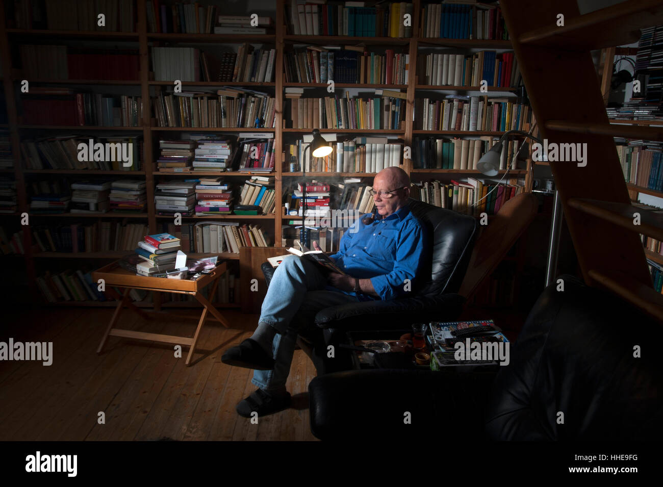 Reading a book and smoking pipe hi-res stock photography and images - Alamy