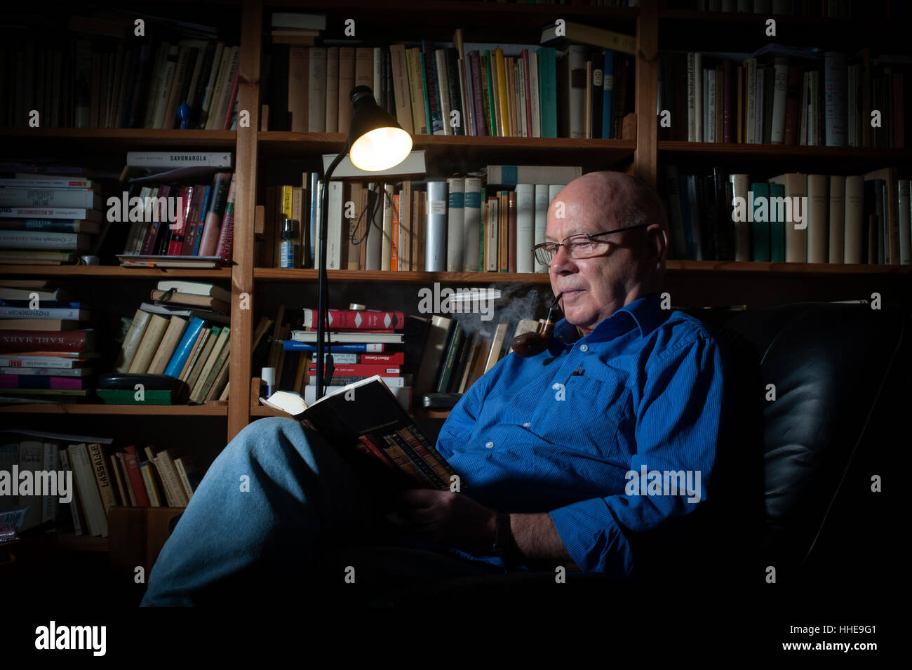 Reading a book and smoking pipe hi-res stock photography and images - Alamy