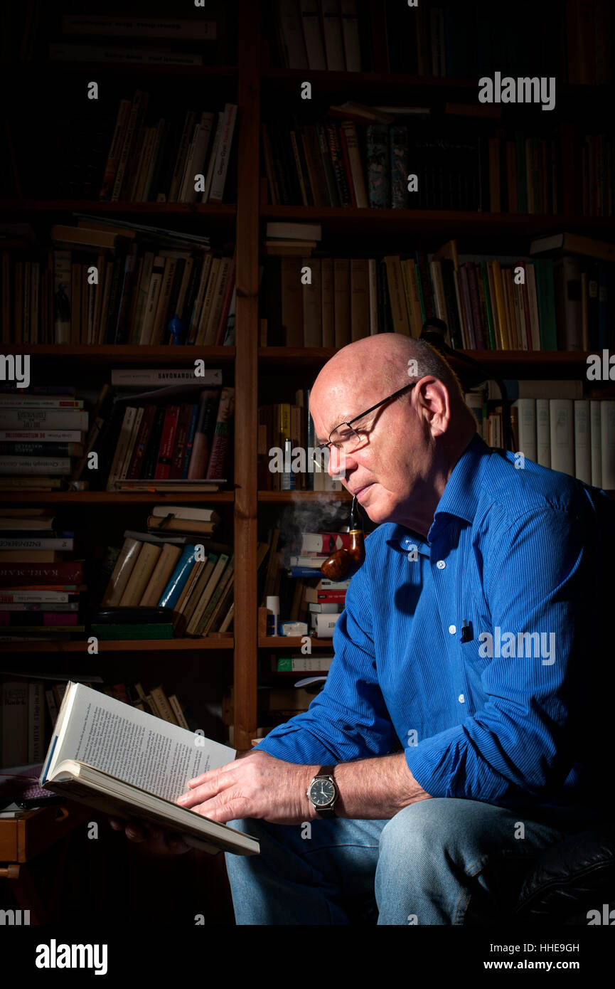 Reading a book and smoking pipe hi-res stock photography and images - Alamy