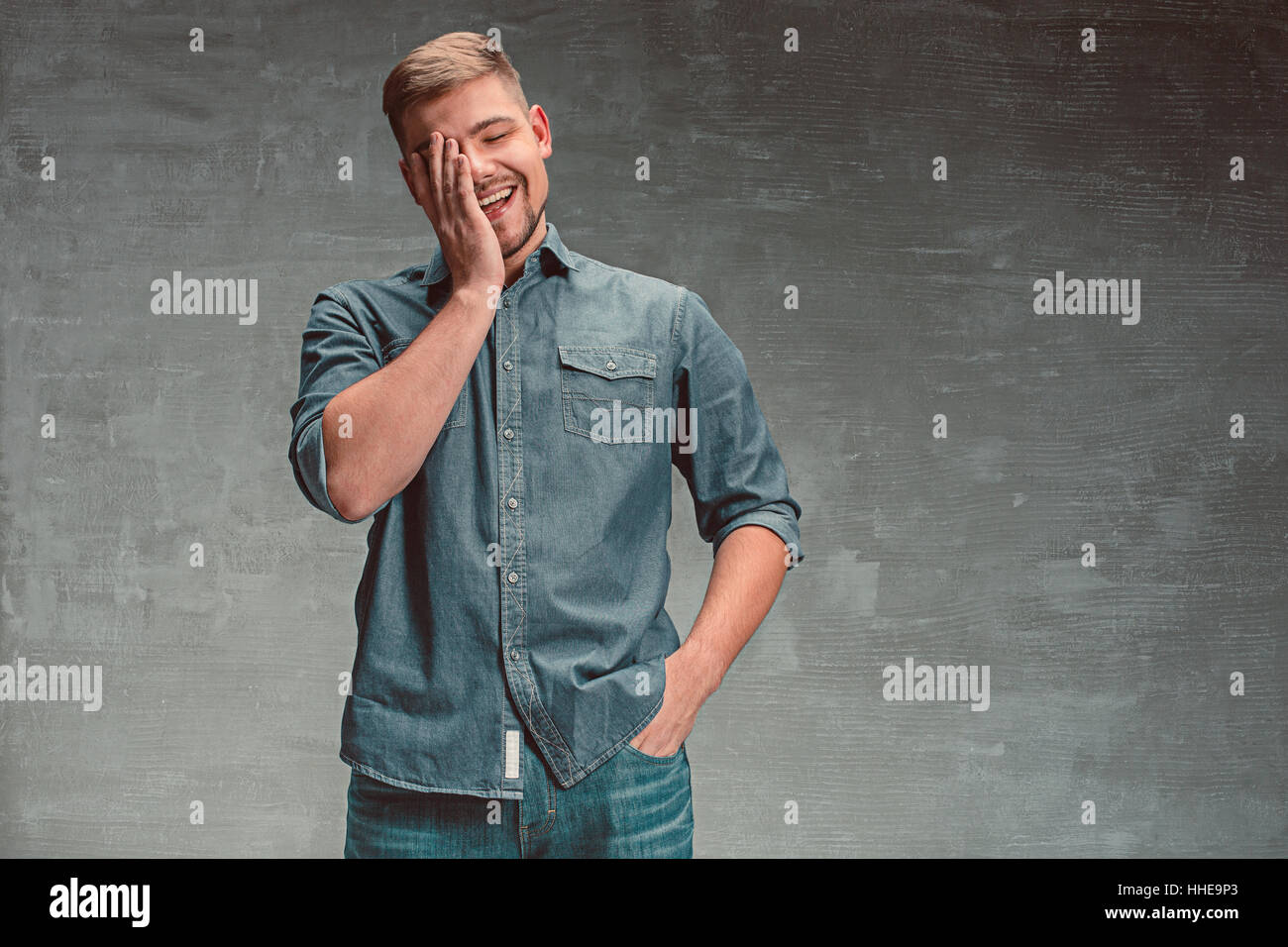 Happy man standing in hi-res stock photography and images - Alamy