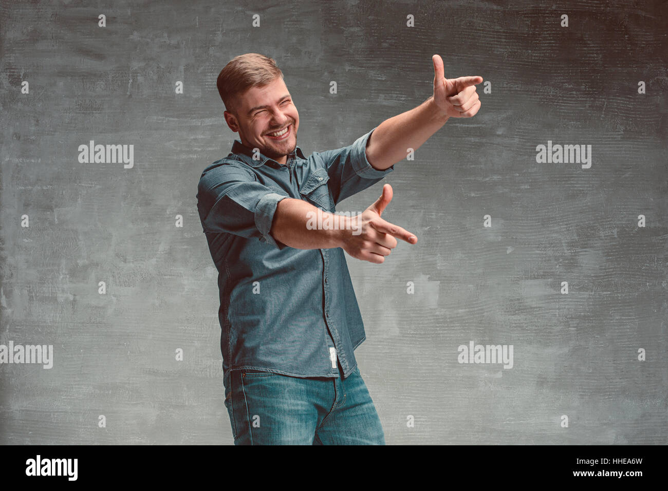 Happy man standing in hi-res stock photography and images - Alamy