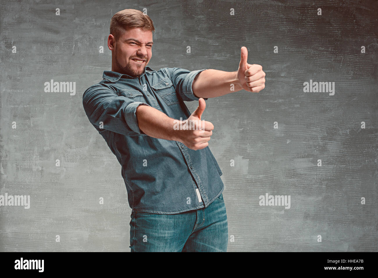 Happy man standing in hi-res stock photography and images - Alamy