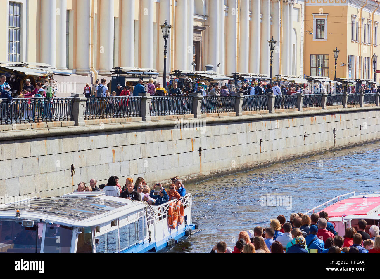 Tourist cruise boats passing on the Griboedov Canal (constructed in ...