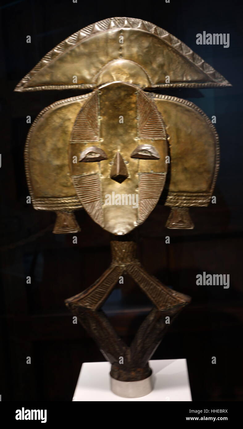 Mbuli Ngulu reliquary figure for ancestor worship; gilded wood. Kota ...