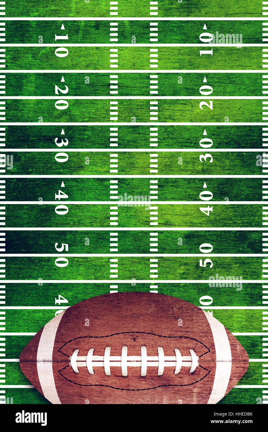 A retro grunge American football field and ball background illustration ...