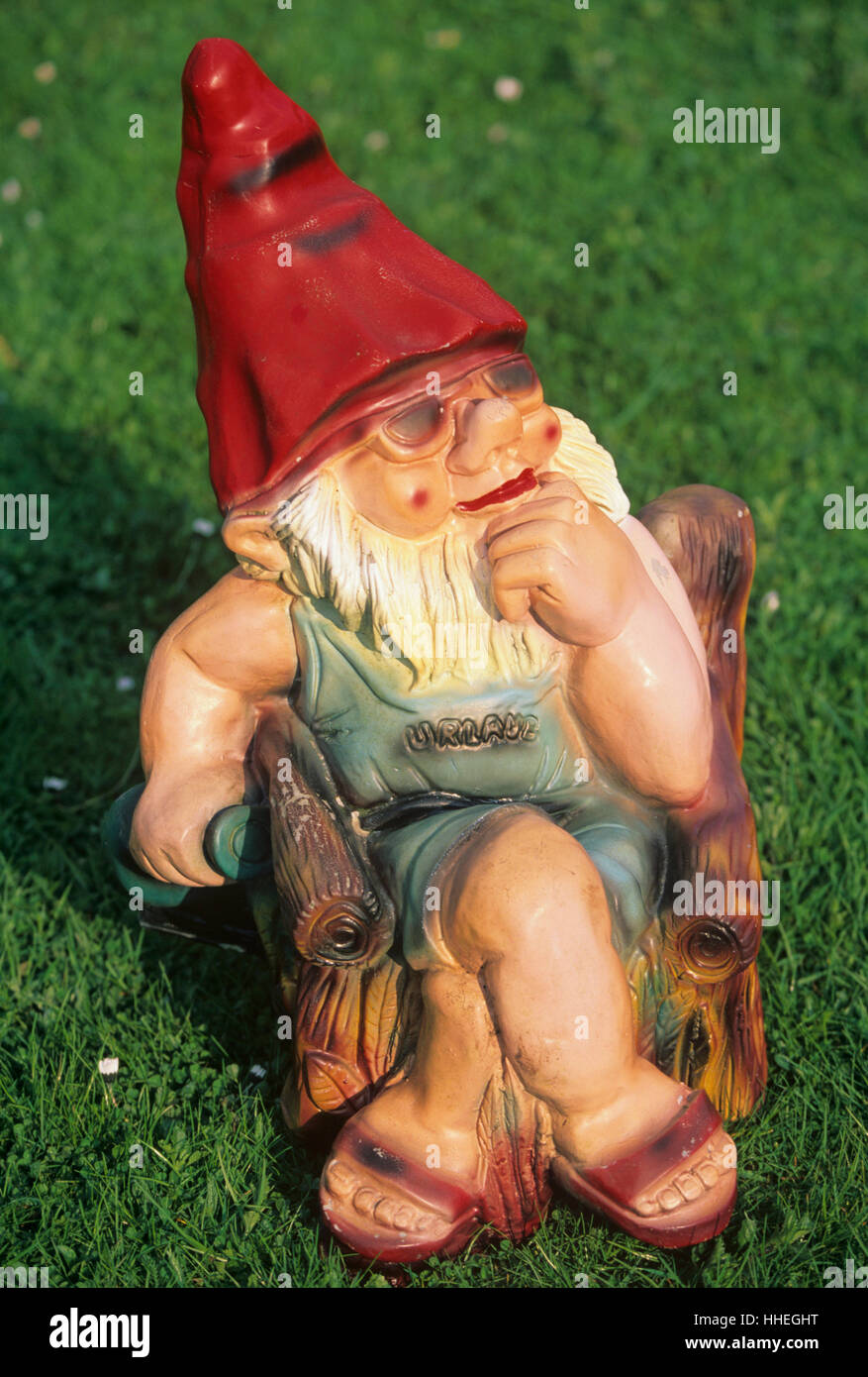 Sitting garden gnome hi-res stock photography and images - Alamy