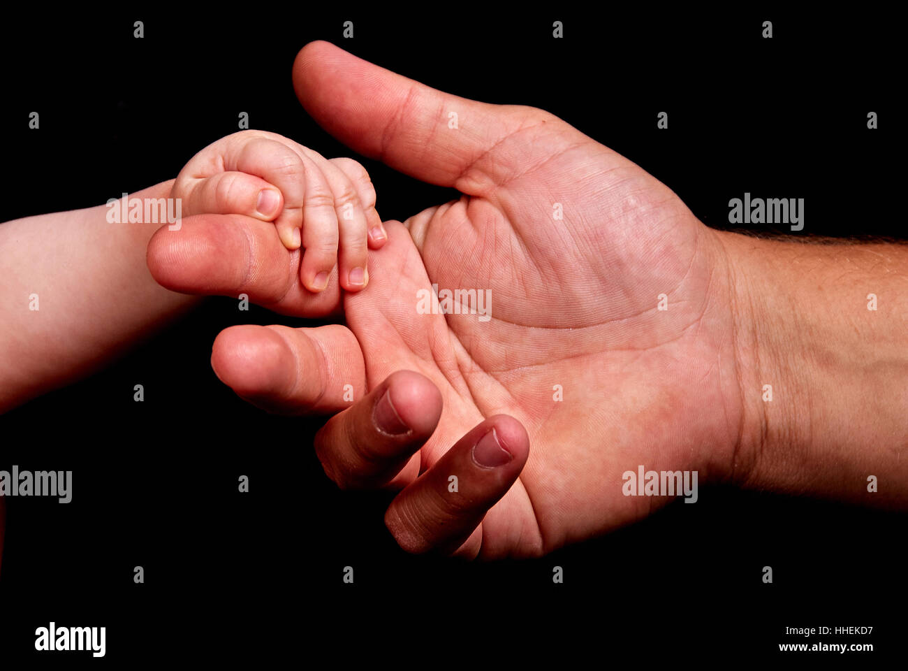baby hand holding Stock Photo - Alamy