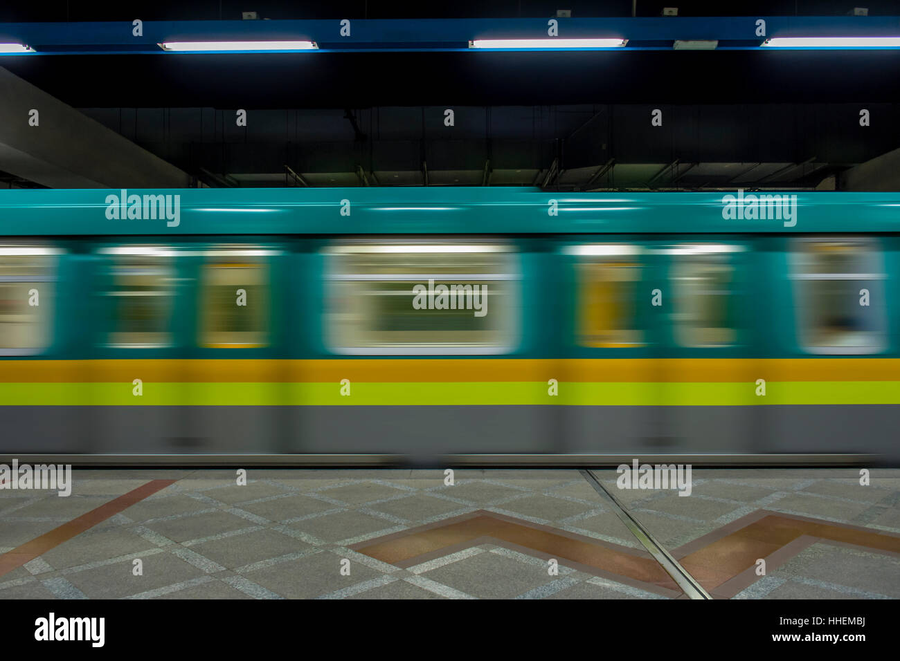 Underground Tube Station with Moving train, motion blurred Stock Photo ...
