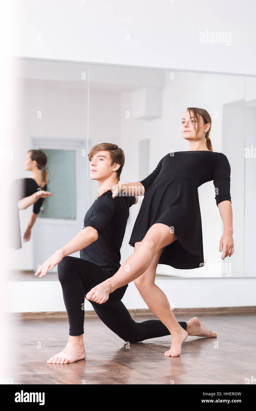 Serious talented dancer leaning backwards Stock Photo - Alamy