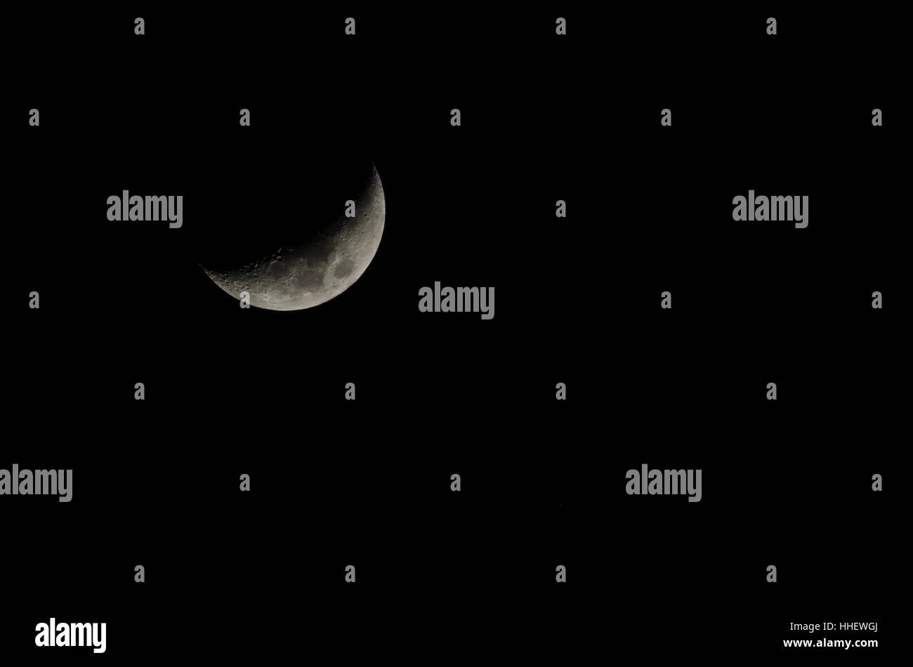 The silver moon isolated on black Stock Photo - Alamy