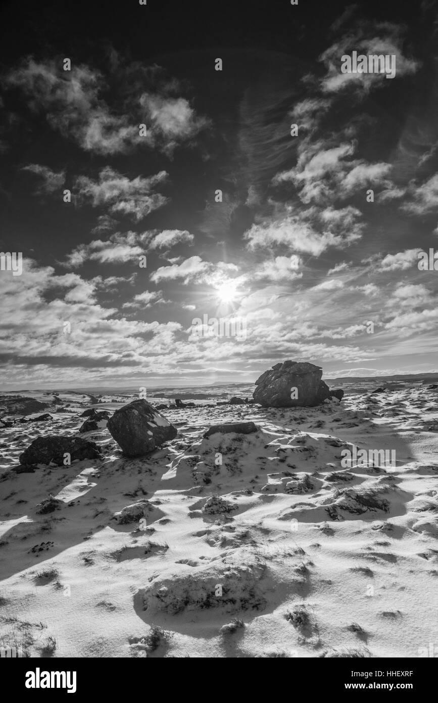 Crummack Dale Norber Erratic Boulders in winter in monochrome Stock ...