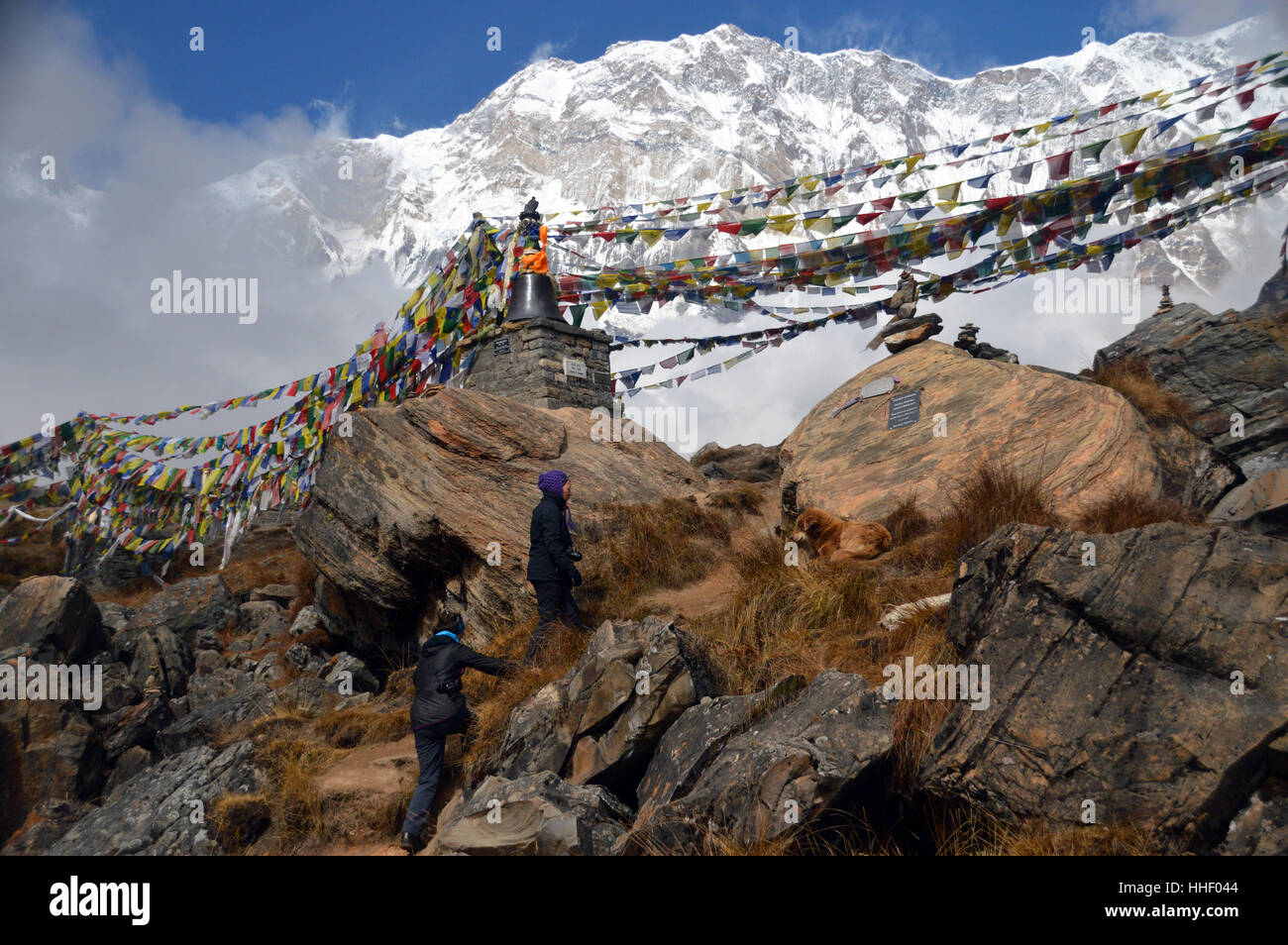 Two Lady Trekkers Climbing up to the Bell Shrine for Ian Clough/Cesar ...