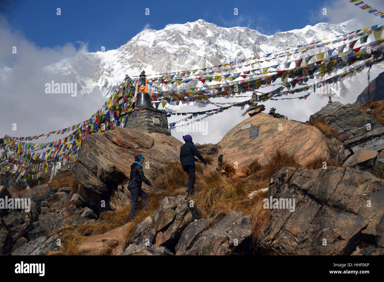 Two Lady Trekkers Climbing up to the Bell Shrine for Ian Clough/Cesar ...