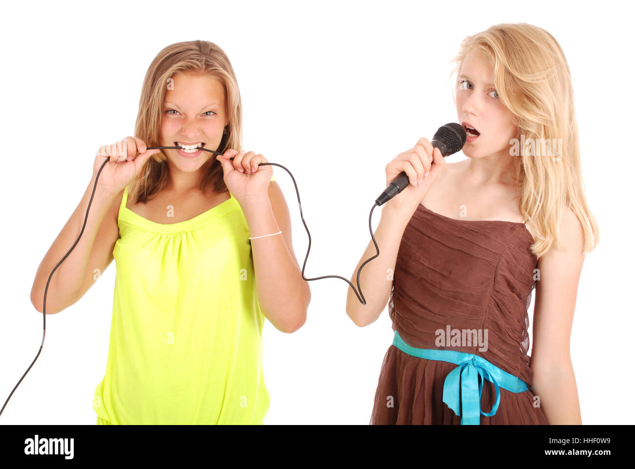 Young beautiful teenage girl conducts interviews with the singer ...