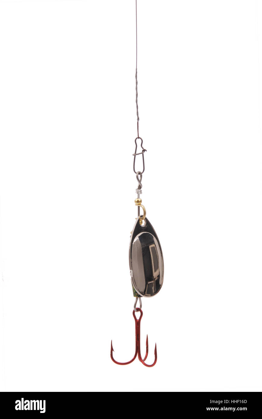 Metal fishing spoon hanging top of the screen isolated on white Stock ...