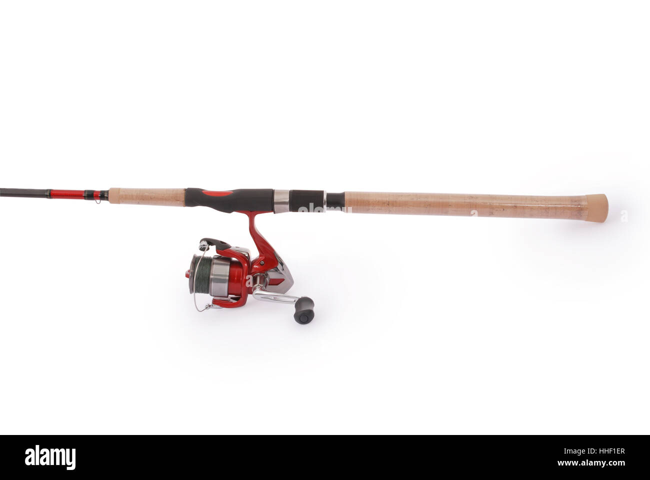 Fishing rod with a reel isolated on white background with soft shadow ...