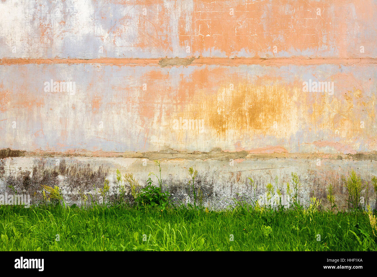 Concrete block wall and with green grass Stock Photo - Alamy