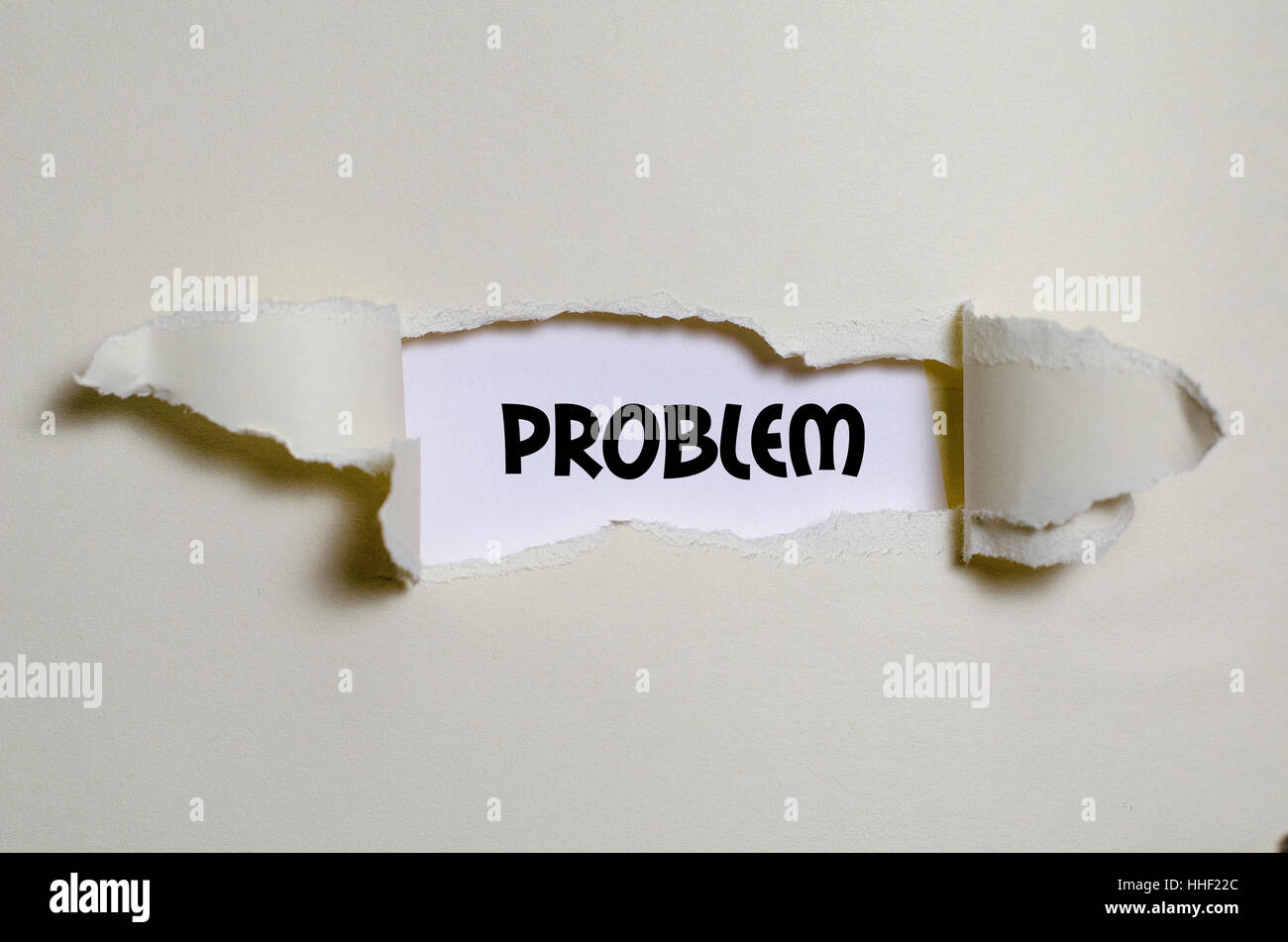 The word time to problem appearing behind torn paper Stock Photo - Alamy