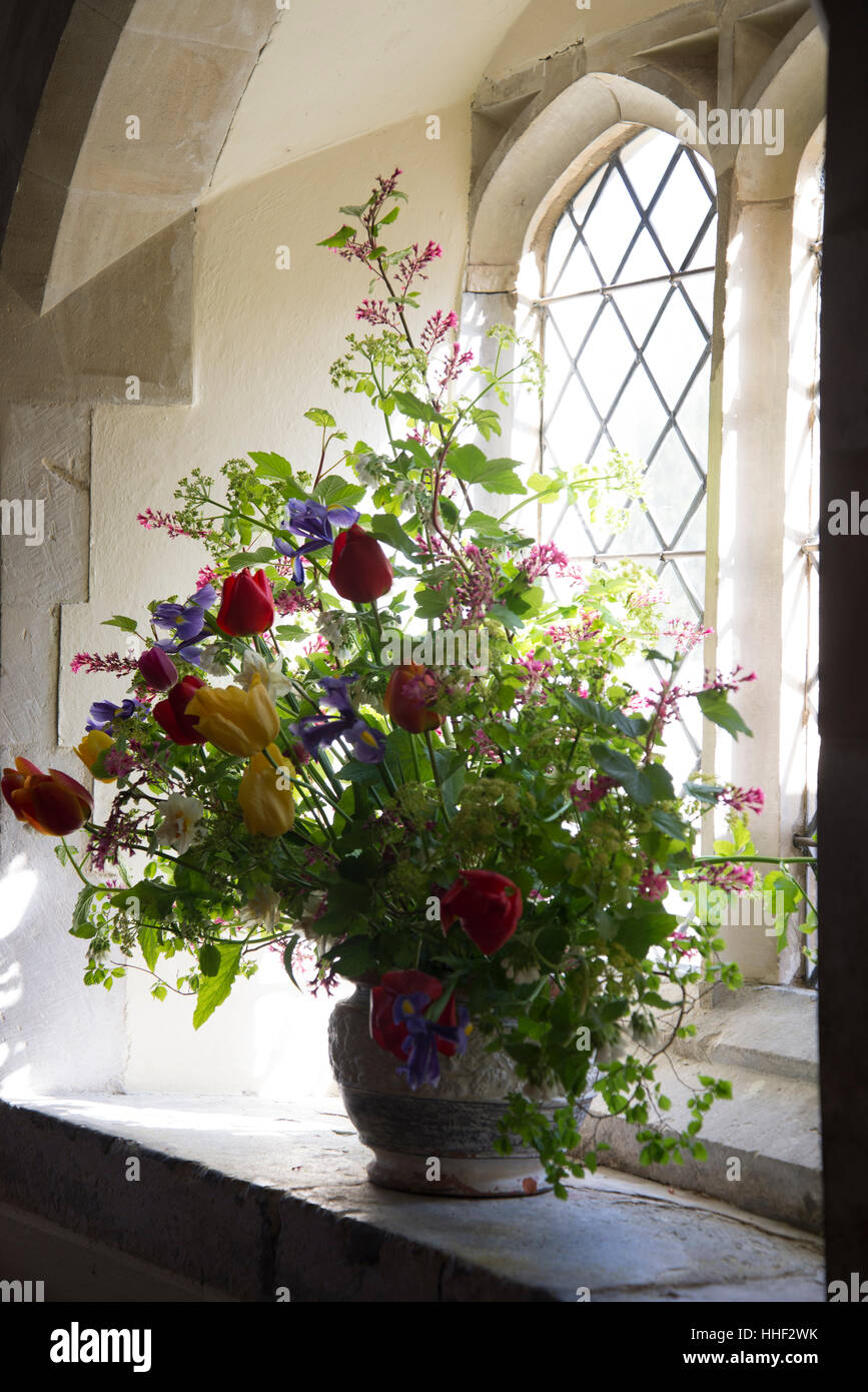 Firle Saint Peter's flower arrangement strong light Stock Photo - Alamy