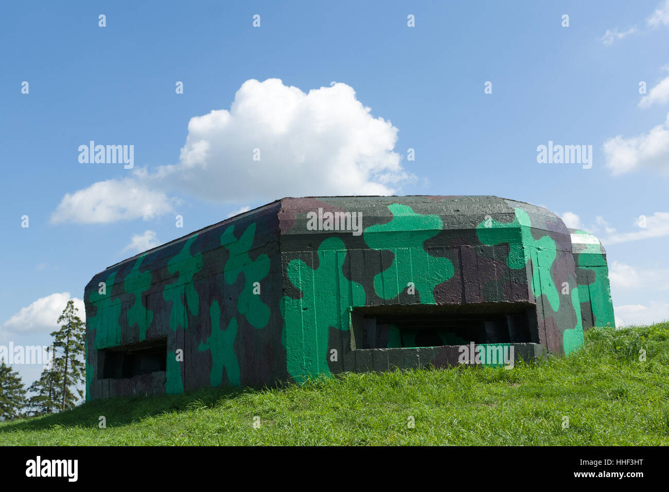 military fortification built of concrete and serves as a point of fire ...