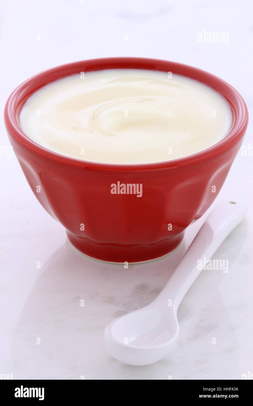Delicious, nutritious and healthy fresh plain yogurt on vintage carrara ...