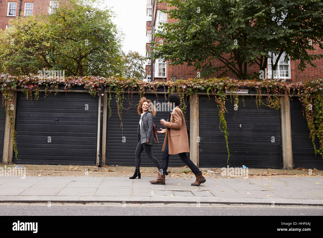 Man walking past on street hi-res stock photography and images - Alamy