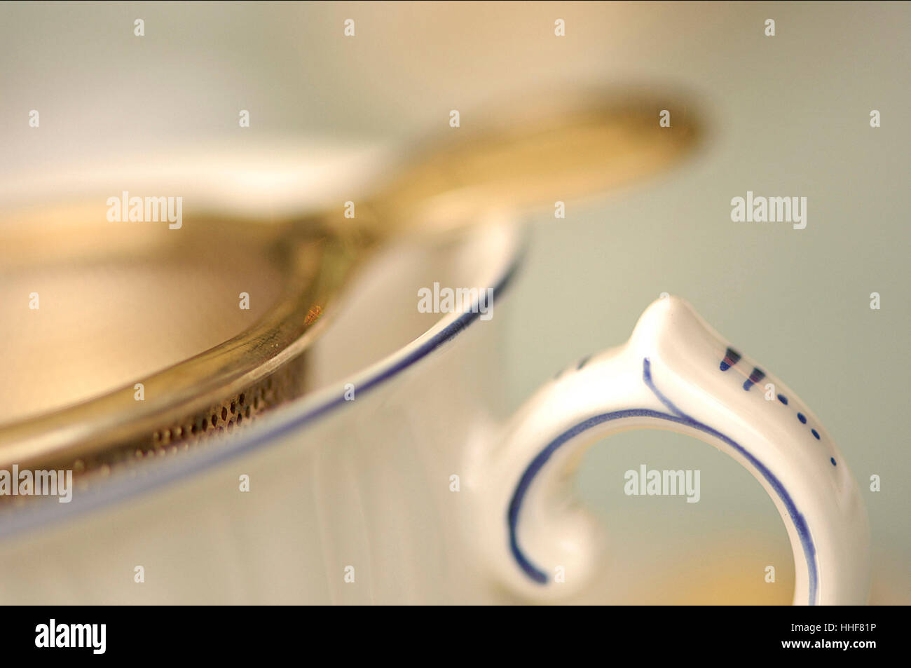 Handle of china teacup Stock Photo - Alamy