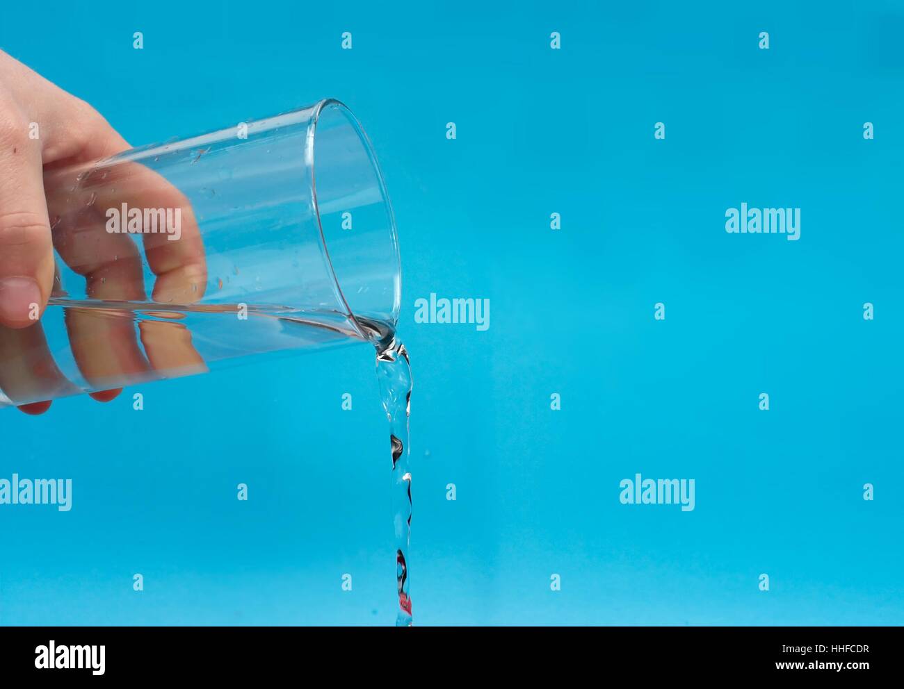 Pouring out a glass of water Stock Photo - Alamy