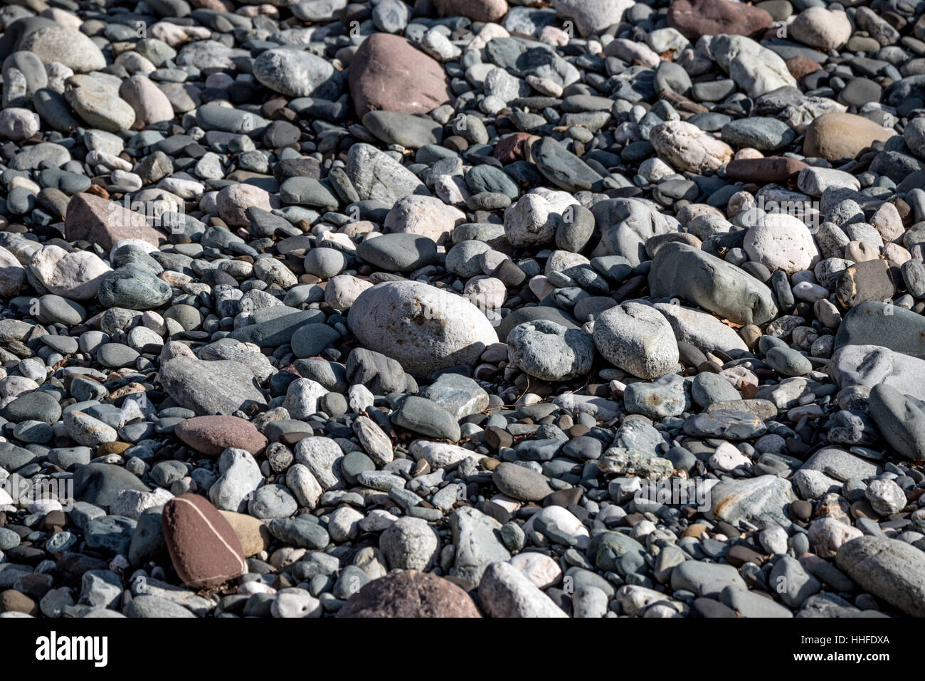 Nice background image of pebbles on a beach Stock Photo - Alamy