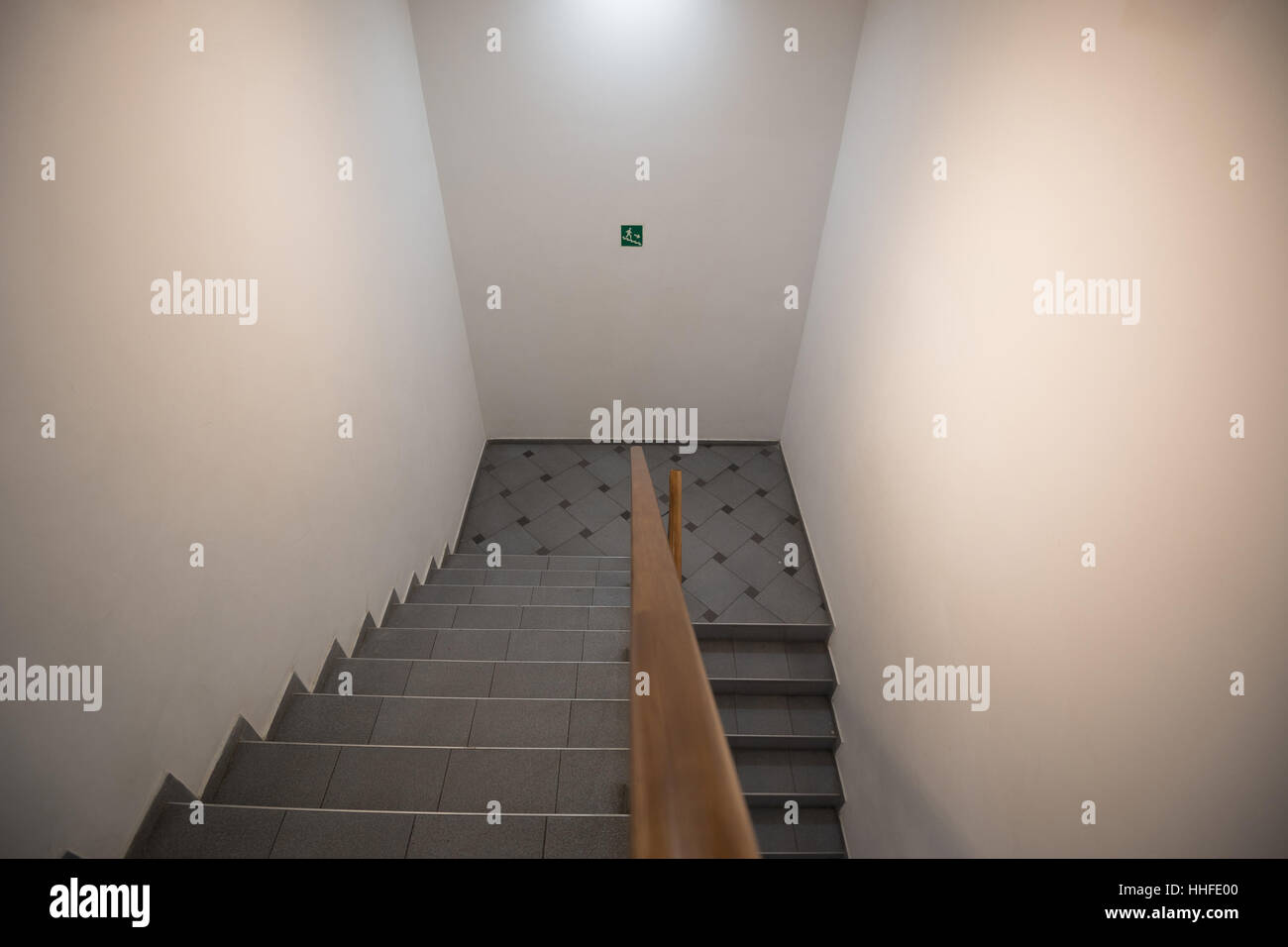 Back door staircase with exit sign for emergency evacaution Stock Photo ...