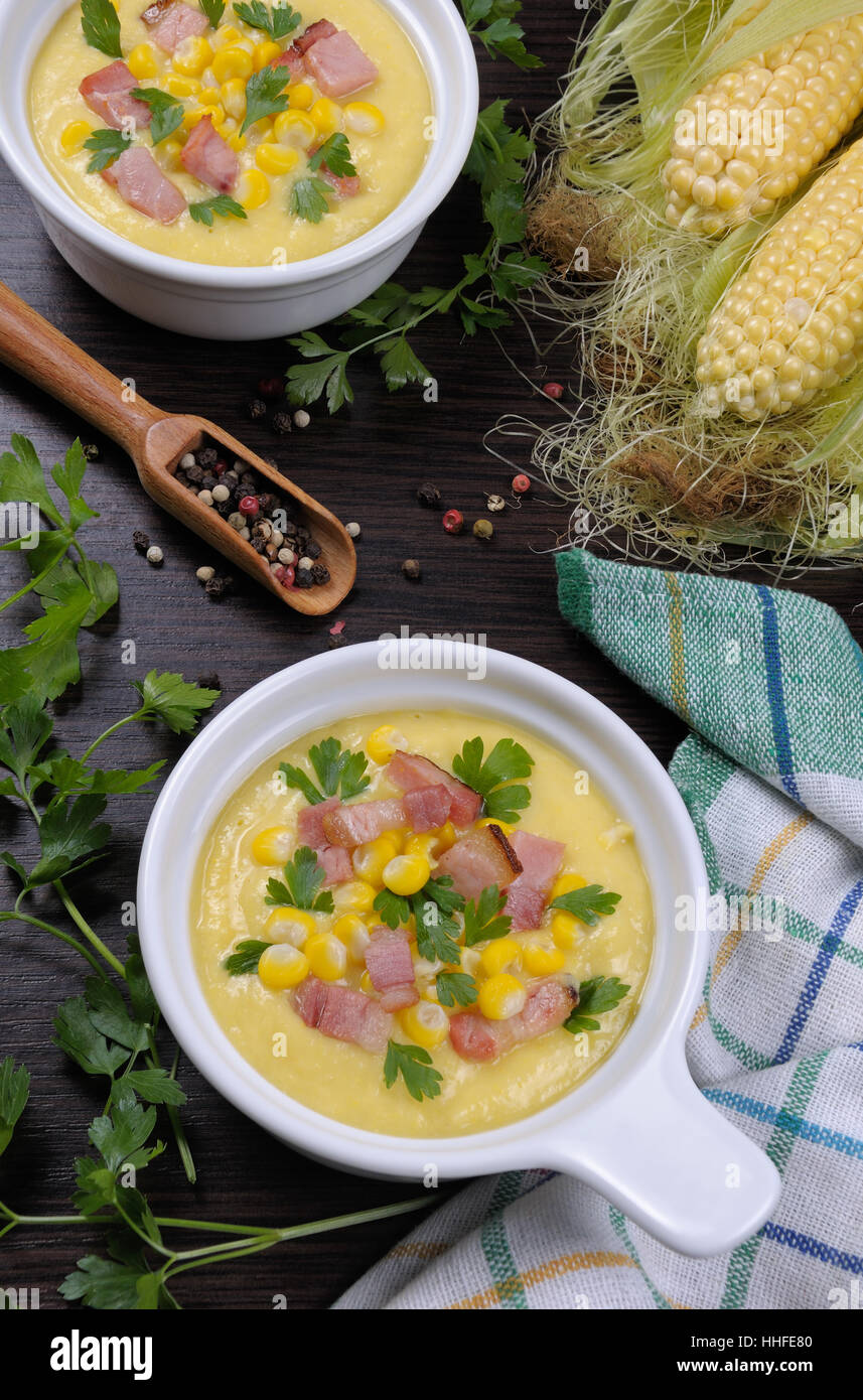 Puree soup with mealies with slices of fried bacon with parsley Stock ...