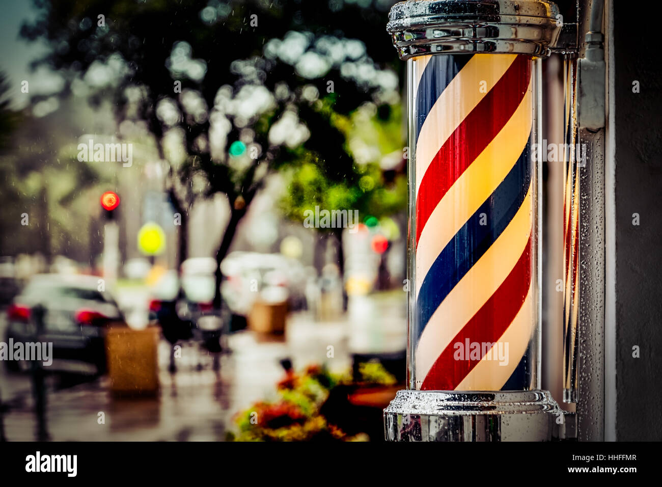Rain collecting on a barber shop pole in southern California Stock ...