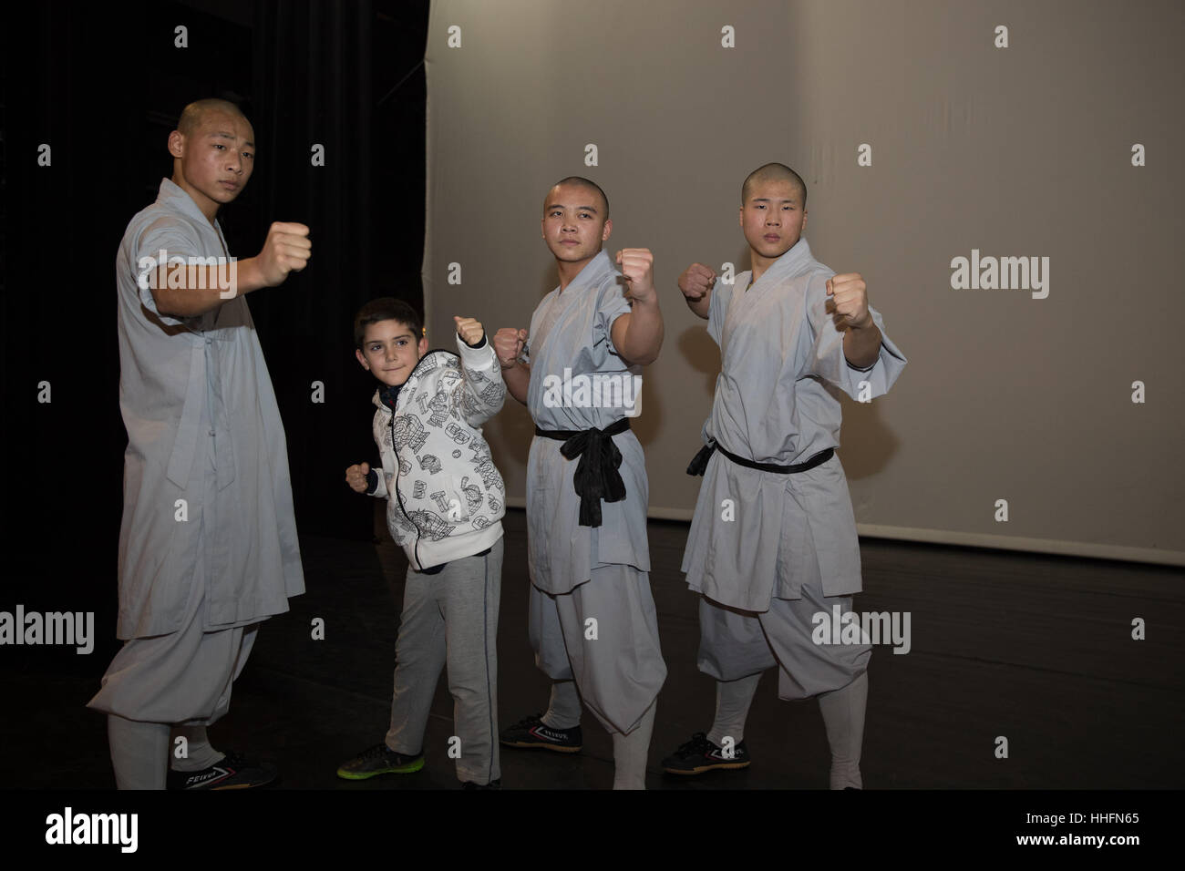 Tel Aviv, Israel. 18th Jan, 2017. Shaolin monks and a local kid pose ...