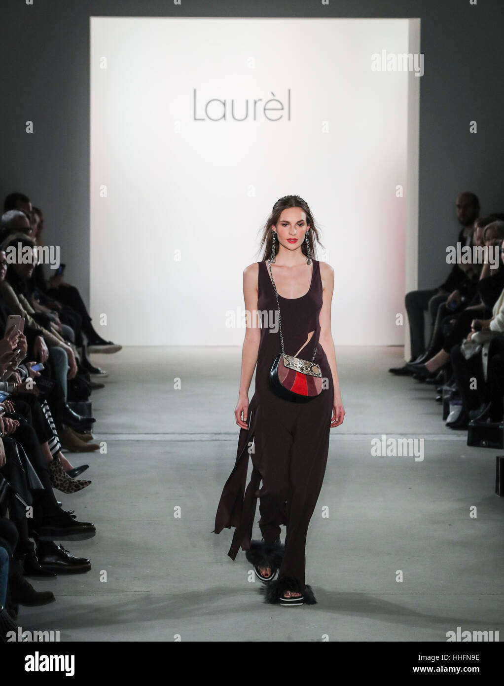 Berlin, Germany. 18th Jan, 2017. A model displays a creation of German ...