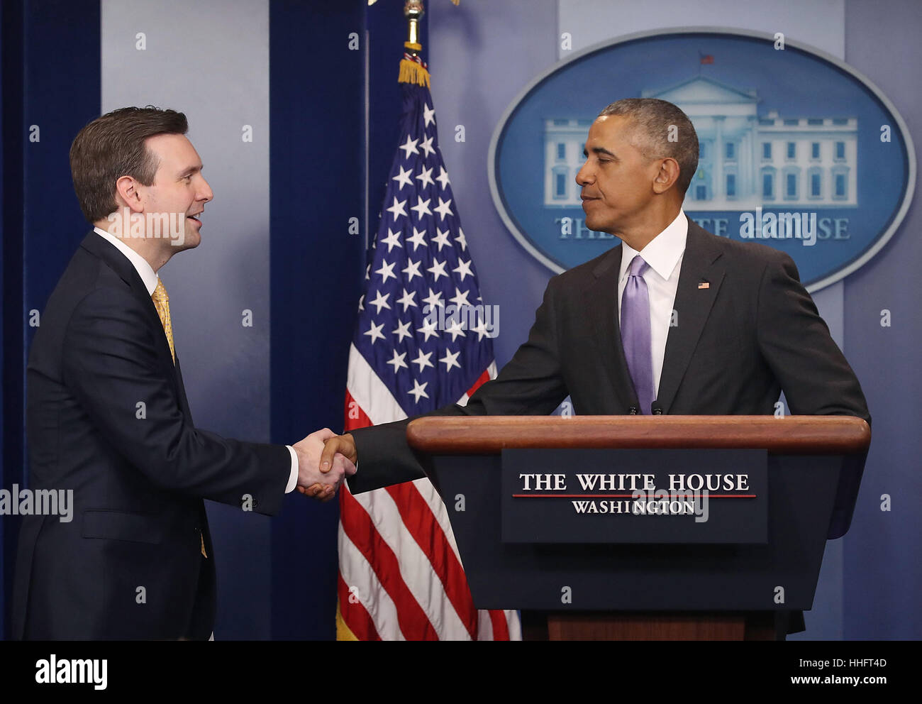 United States President Barack Obama shakes hands with White House ...