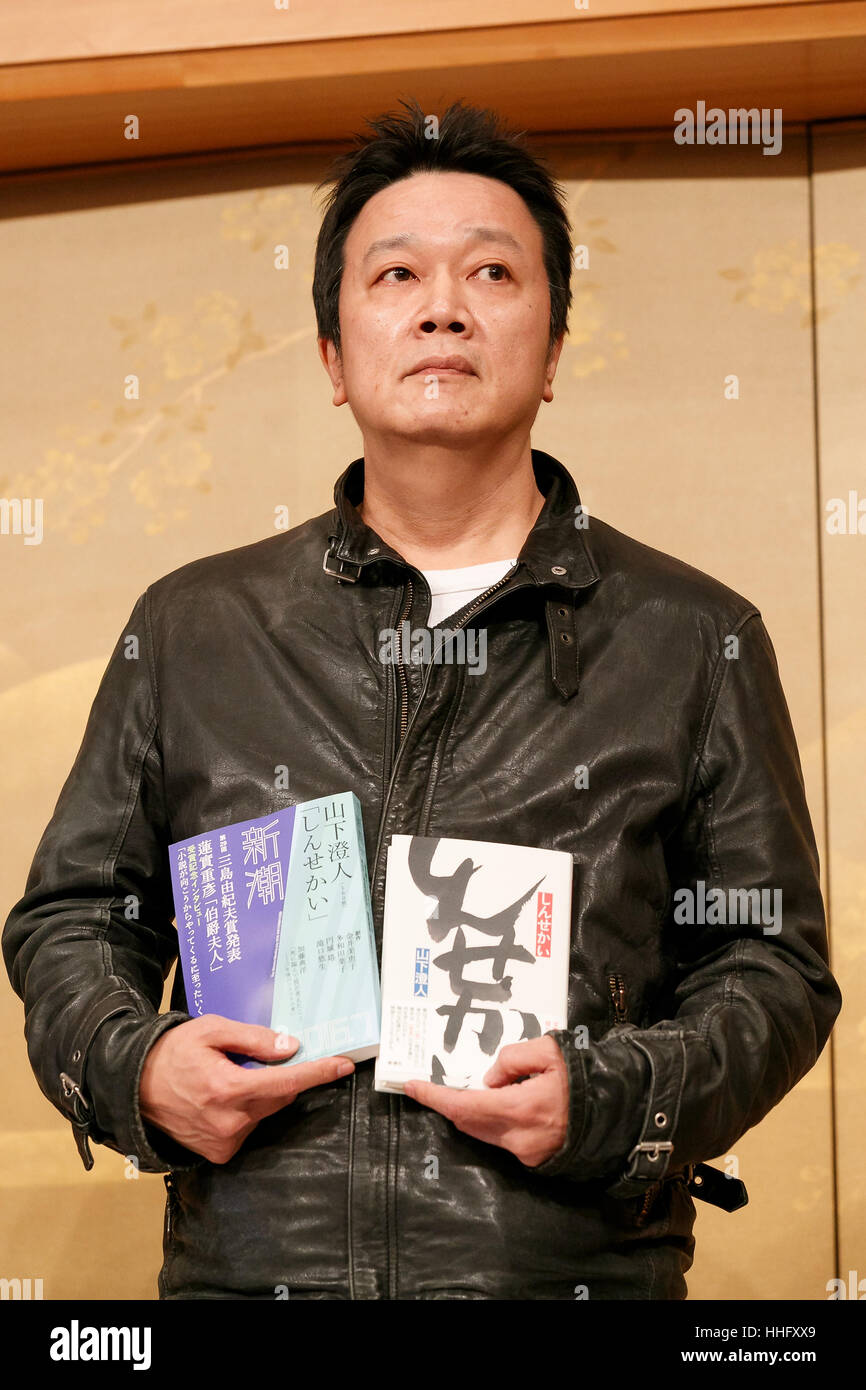 The 156th Akutagawa Prize winner Yamashita Sumito, poses for cameras ...