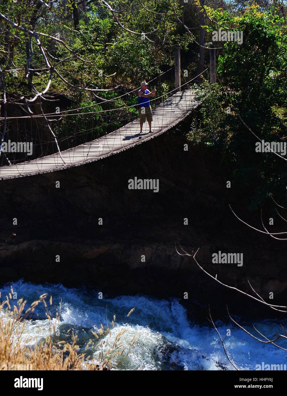 Si Phan Don, Laos. 19th Jan, 2017. A tourist takes photos on a ...
